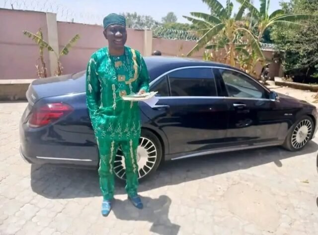Arome Osayi Gifts New Car To Spiritual Father Rev John Akpami